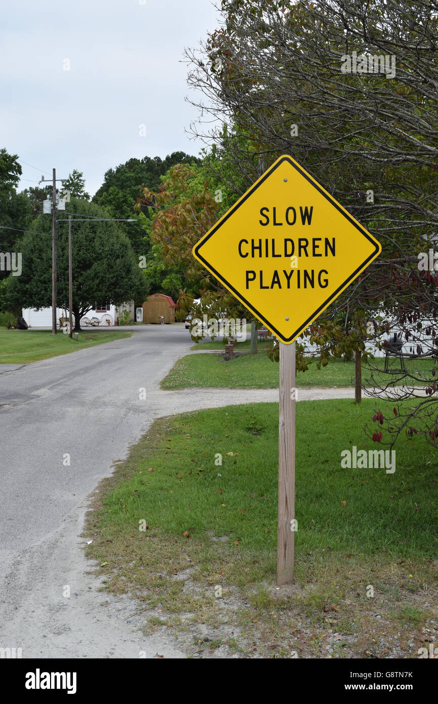 A sign warning of children playing in the street Stock Photo - Alamy