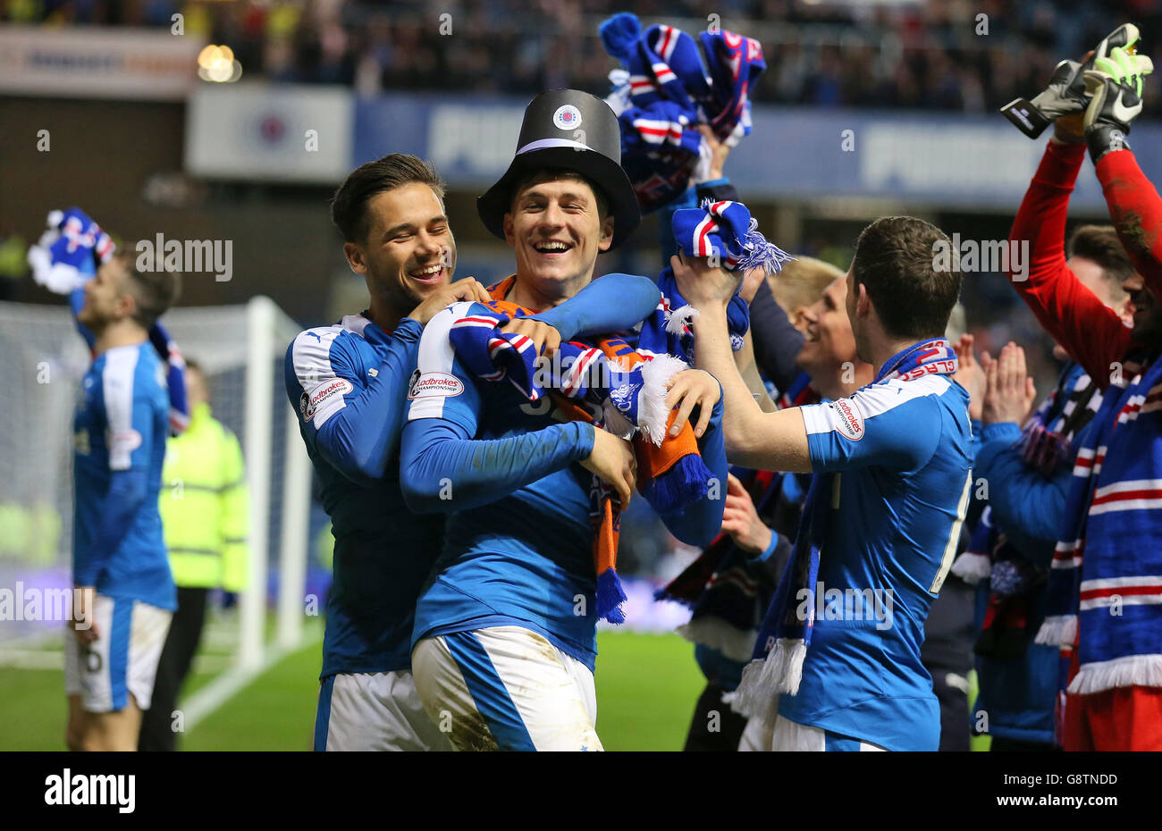 Rangers' Rob Kiernan (centre) and Harry Forrester (left) celebrates ...