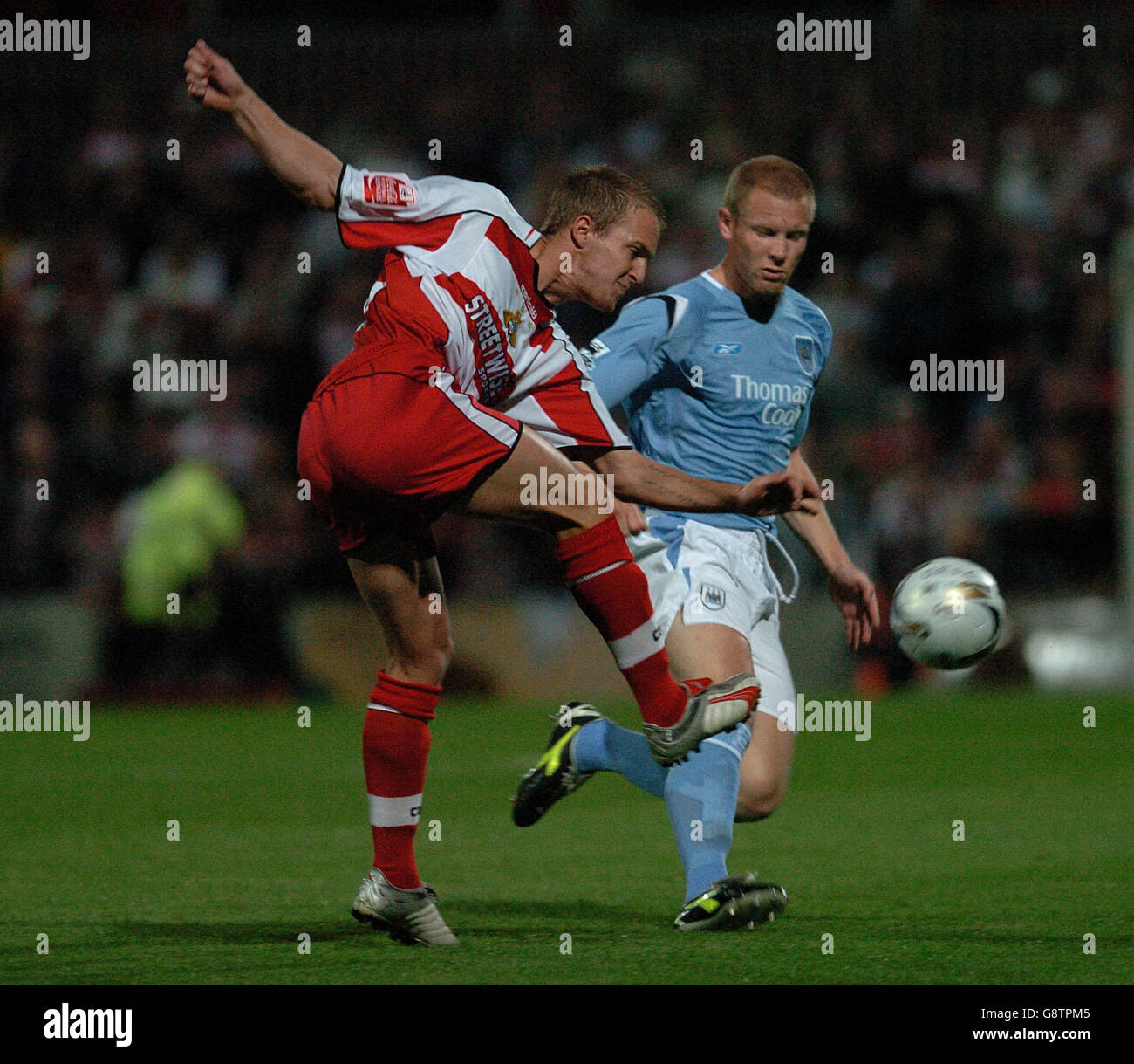 Doncaster rovers james coppinger and manchester citys ben thatcher hi ...