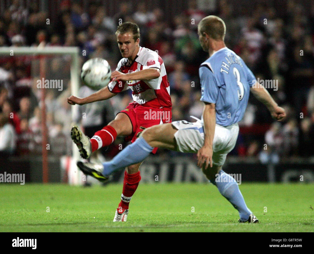 Doncaster rovers james coppinger and manchester citys ben thatcher hi ...