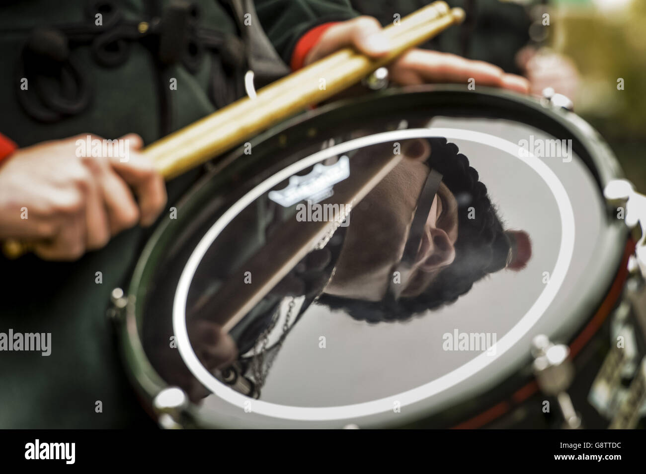 A reflection in a snare drum played by The Rifles Band and Bugles ...