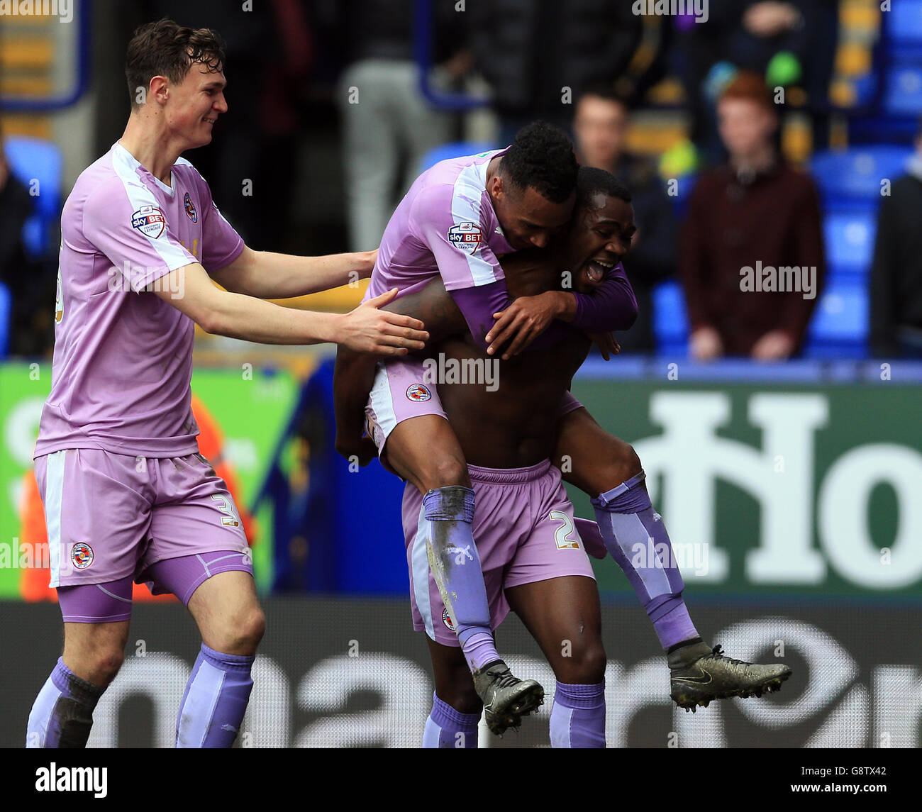 Reading's Ola John (Right) celebrates with his team-mates Jake Cooper ...