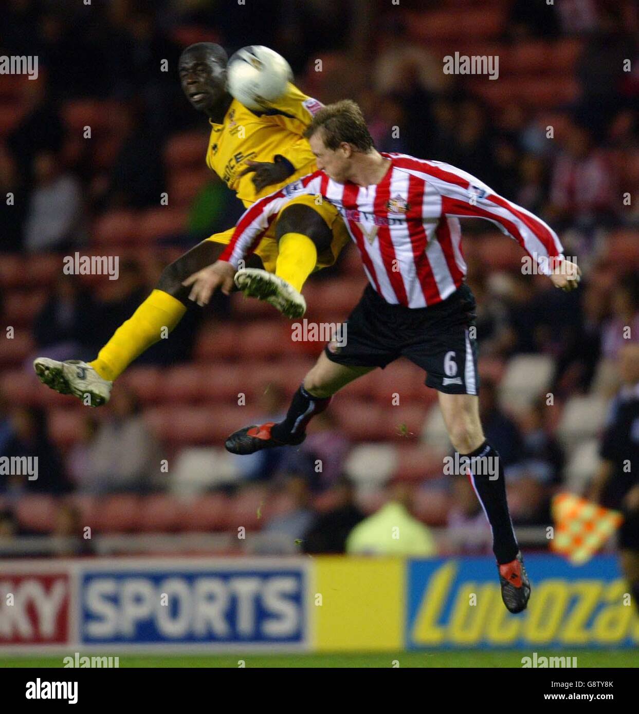 Sunderland's Steven Caldwell and Cheltenham Town's Damien Spencer ...