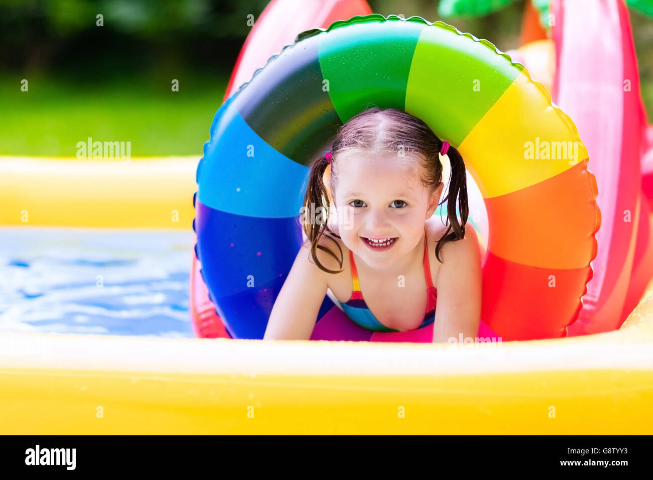 Blue swimsuit kids hi-res stock photography and images - Alamy