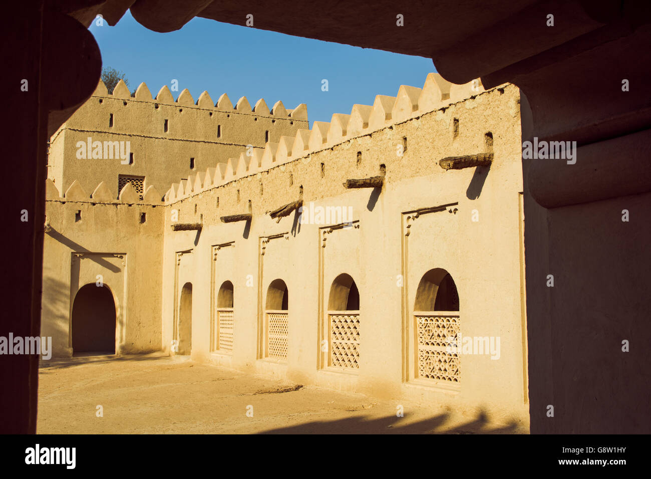 Facade Of Arabic Desert Fort Against Blue Sky Stock Photo - Alamy