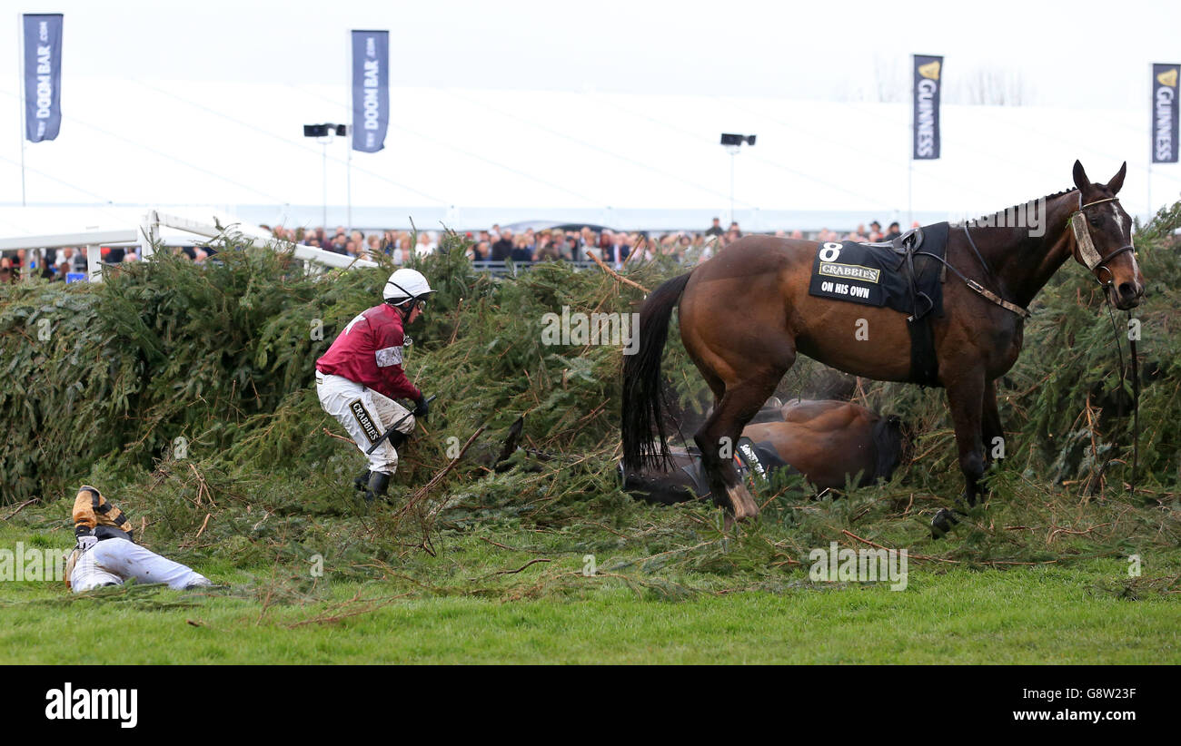 Jockey Patrick Mullins comes off his horse On his Own and jockey Nina ...