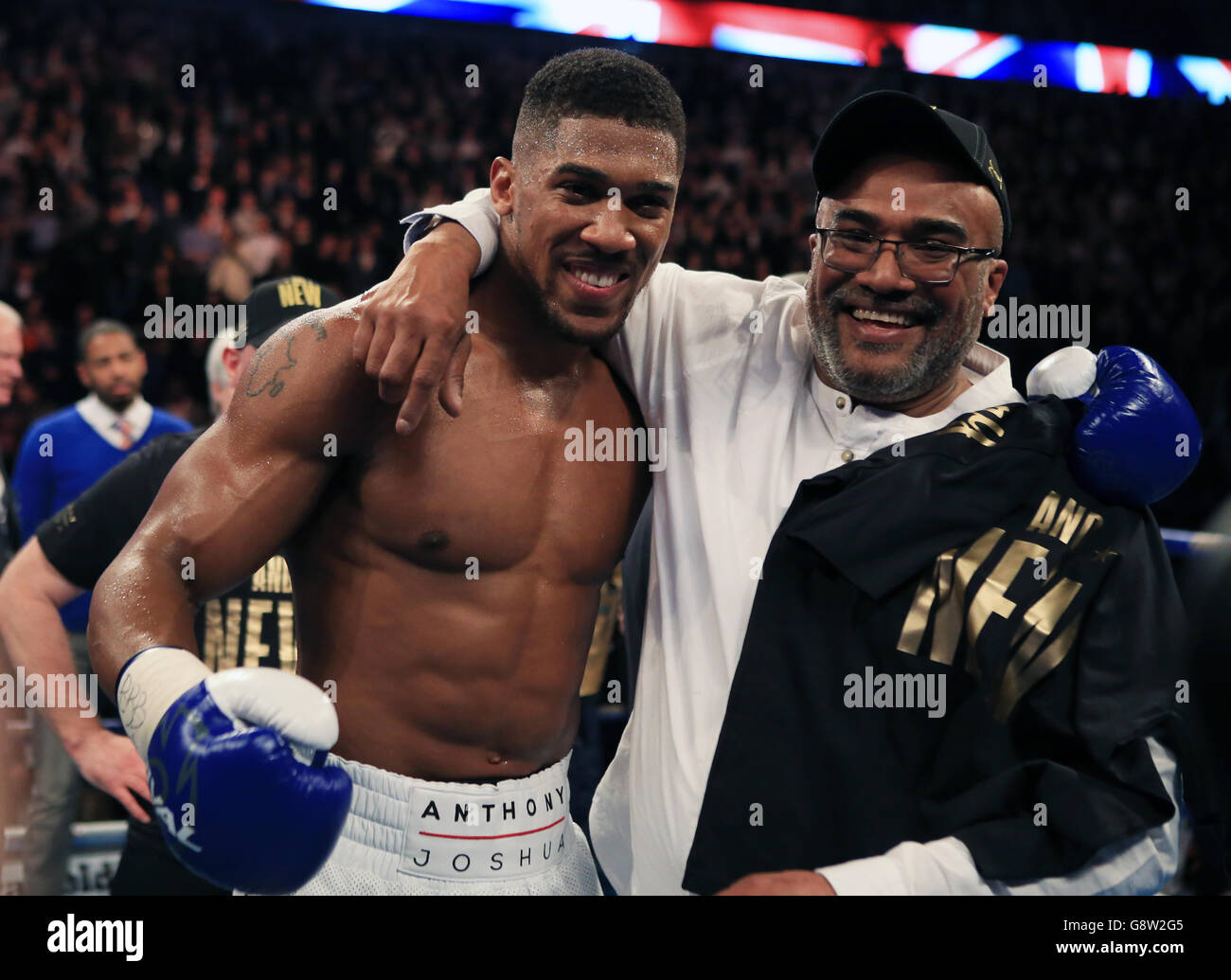 Anthony Joshua celebrates with his father Jonathan after beating ...