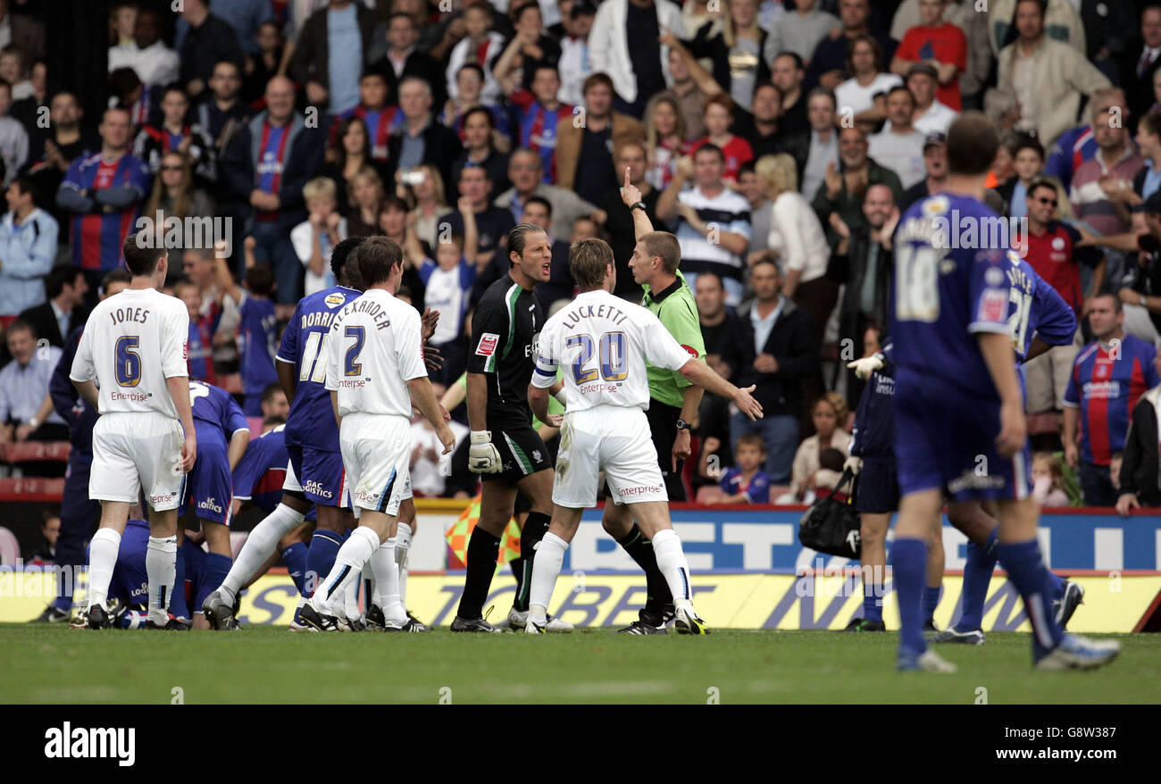 Trouble brews up as referee S J Tanner is surrounded by Preston players ...