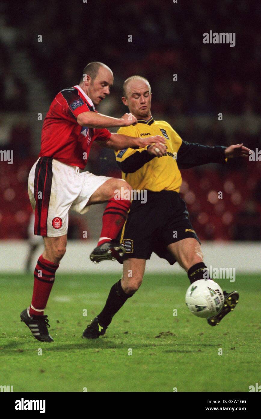 Nottingham Forest's Steve Stone (left) cannot prevent Chris Marsden of ...