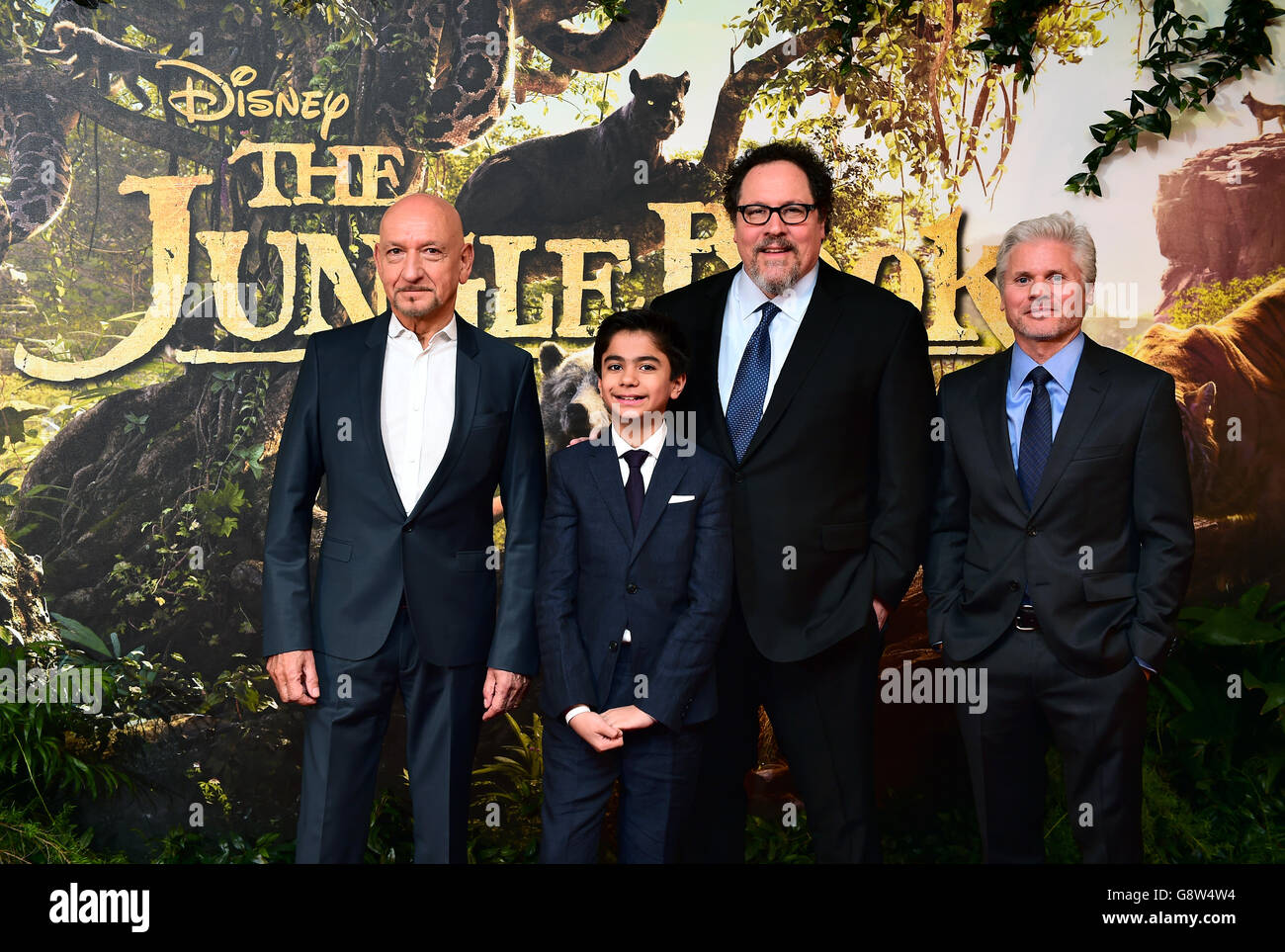Sir Ben Kingsley, Neel Sethi (second left), Jon Favreau (second from ...