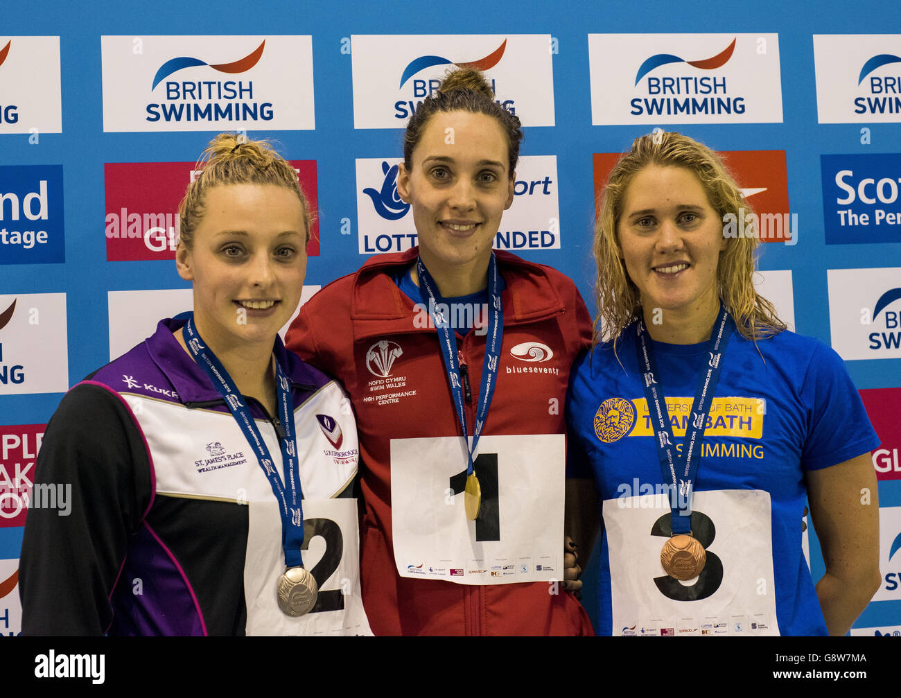 Alys Thomas (centre) with her Gold medal, Siobhan-Marie O'Connor with ...