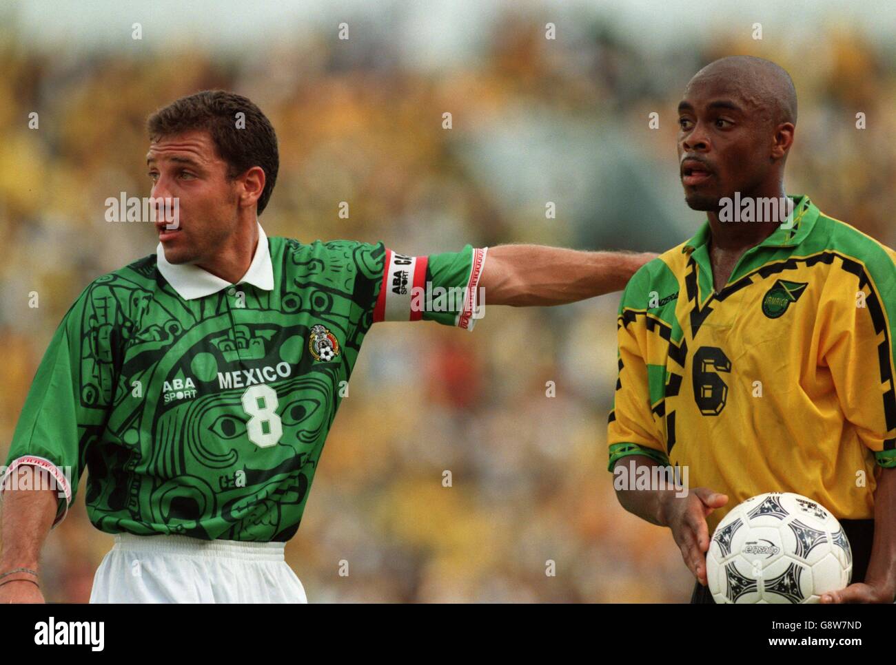 Alberto garcia aspe mexico fitzroy simpson jamaica look back referee hi ...