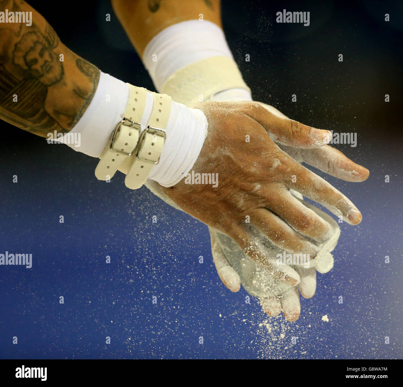 Detail of a gymnast chalking his hands during the Artistic Gymnastics ...