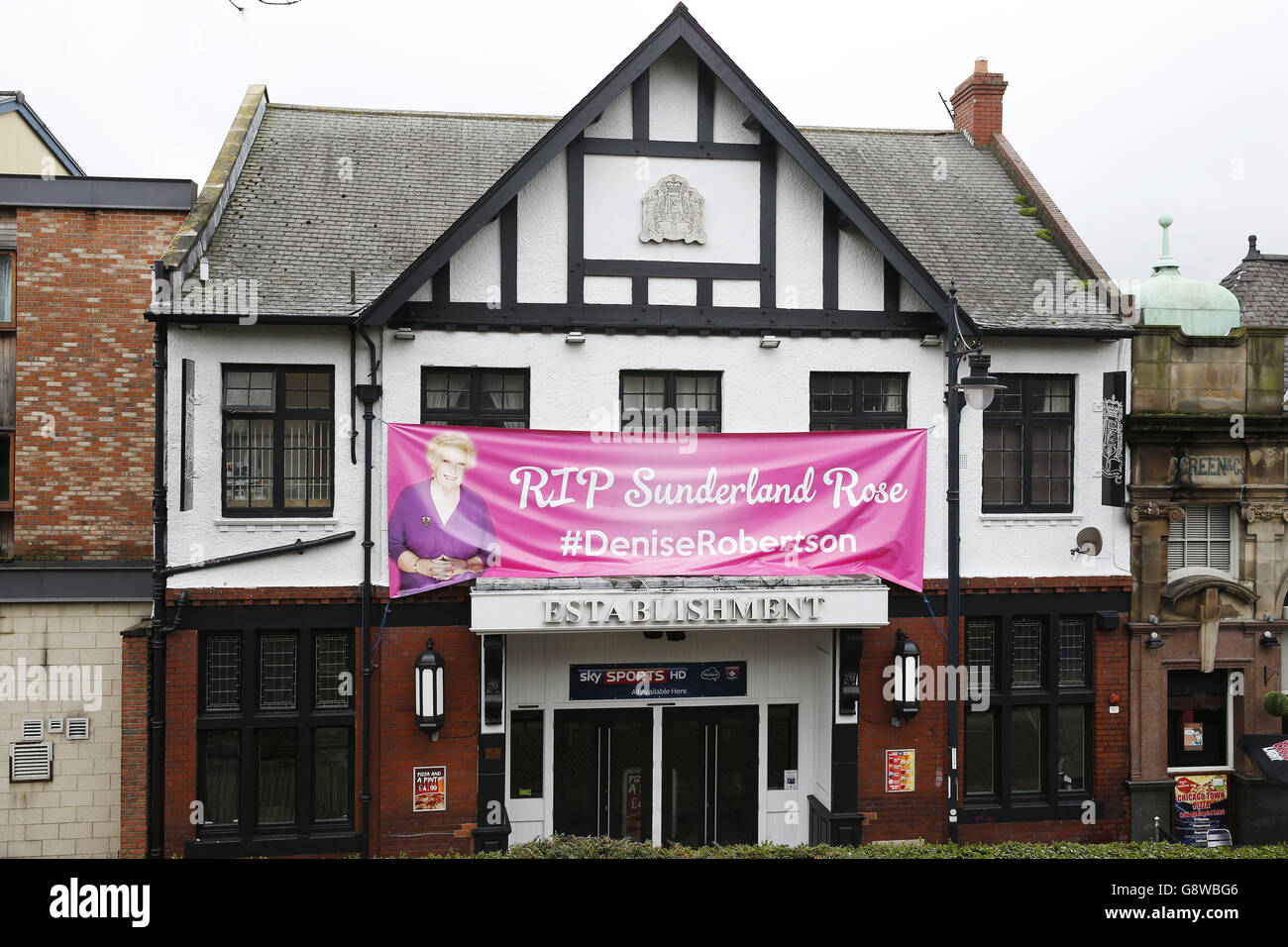A pink banner on the Establishment pub next to Sunderland Minster where ...
