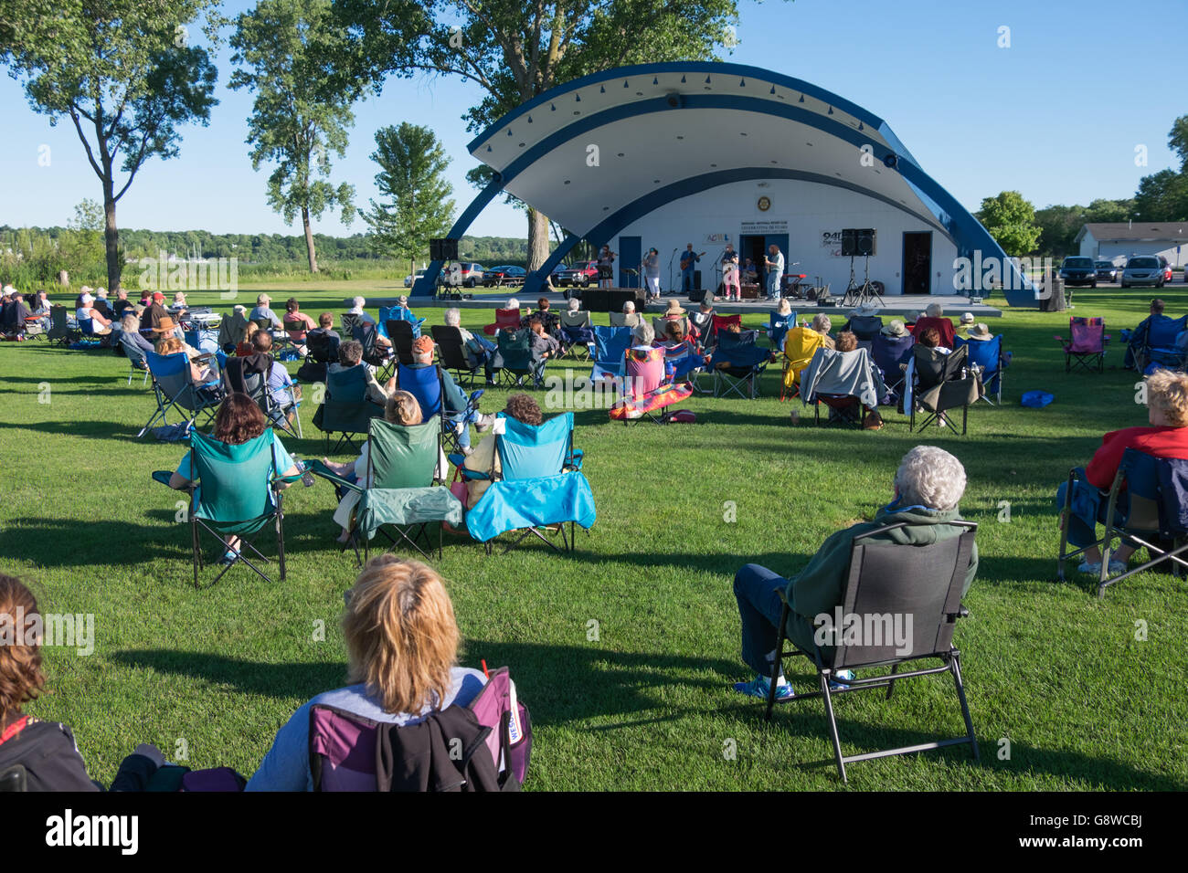 Outdoor community concert at the band shell in Montague, Michigan, USA ...