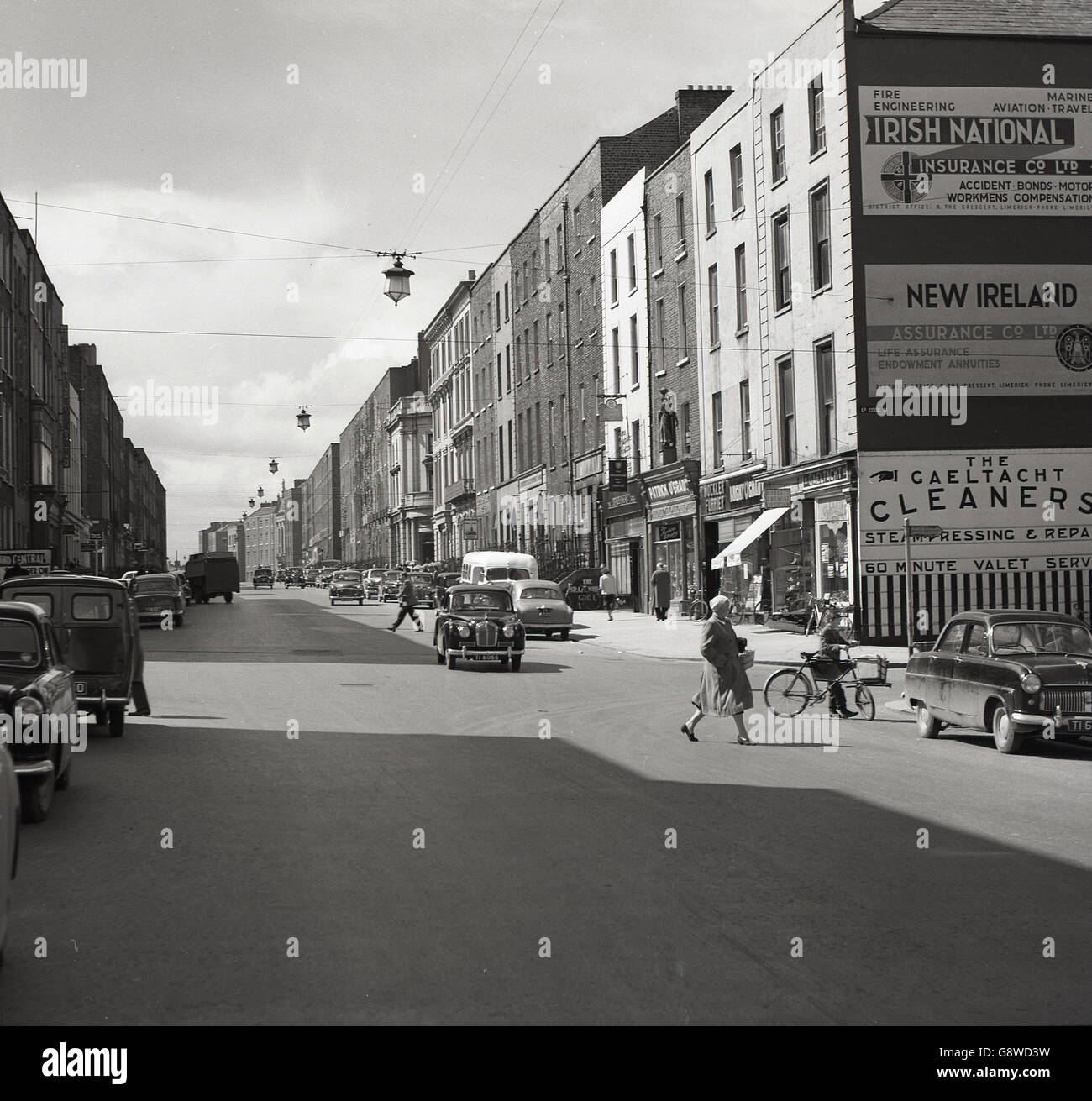 1950s, historical, Ireland, street scene, looking up Lower Cecil St ...