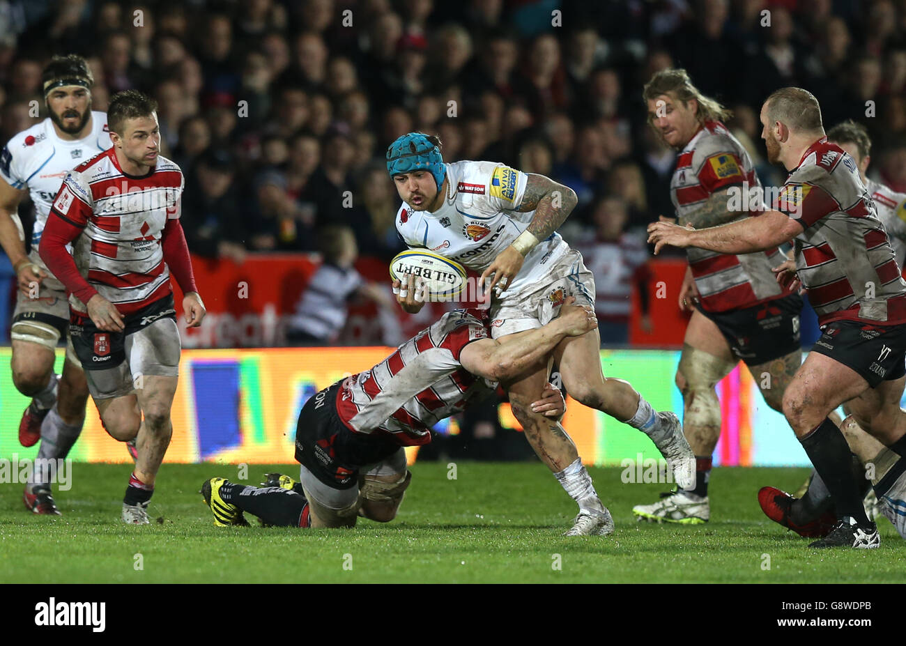 Exeter Chiefs' Jack Nowell tries to break through the Gloucester line ...