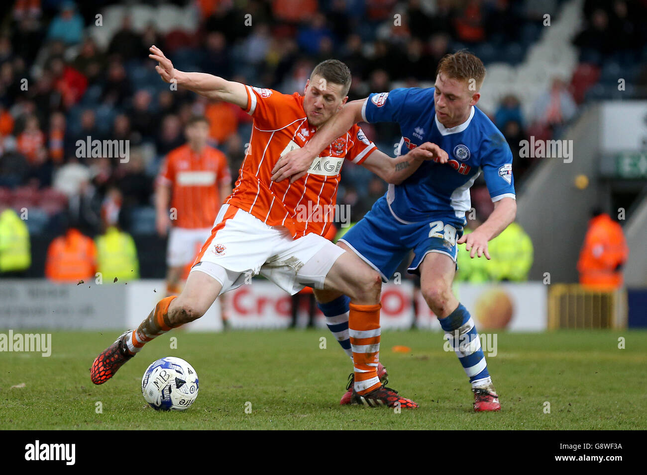 Blackpool's Jim McAlister (left) and Rochdale's Callum Camps battle for ...