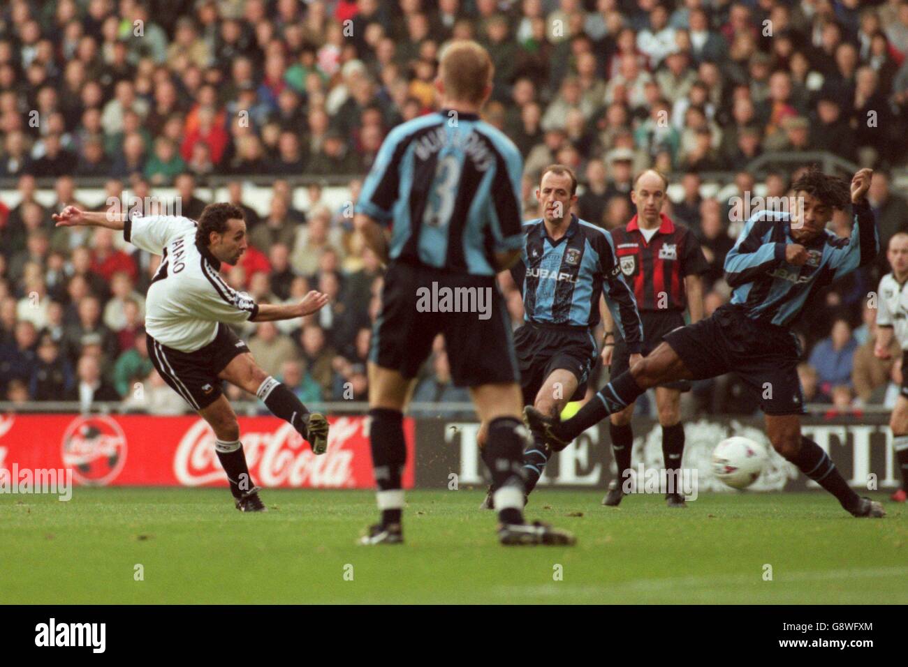 Coventry City's David Burrows (centre) watches as Francesco Baiano of ...