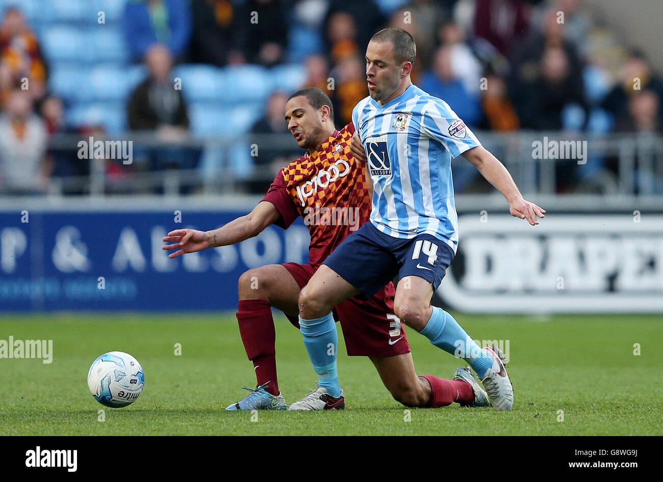 Coventry City's Joe Cole and Bradford City's James Meredith battle for ...