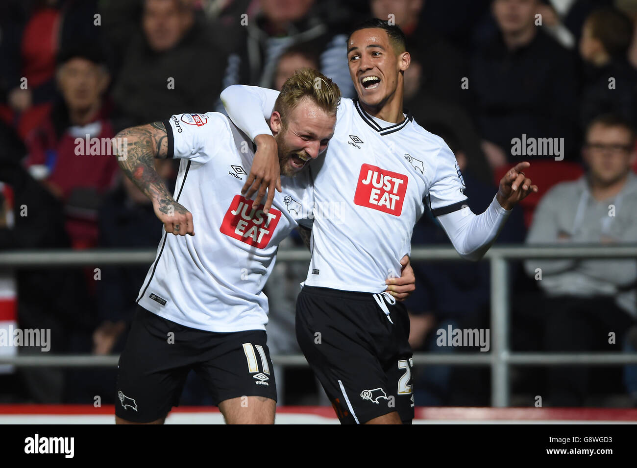 Derby County's Tom Ince (right) celebrates scoring his teams third goal ...