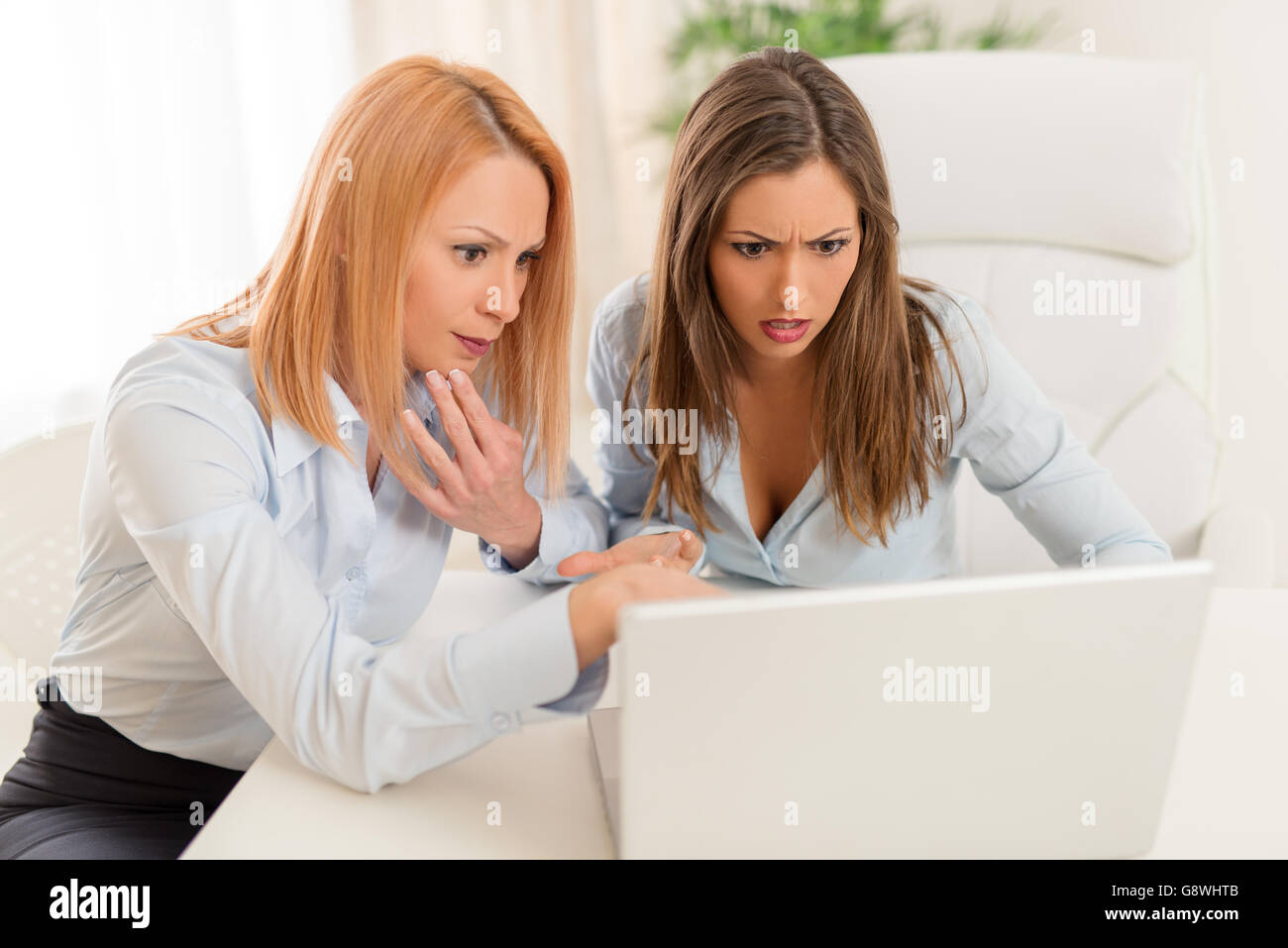 Female Colleagues In The Office Stock Photo - Alamy