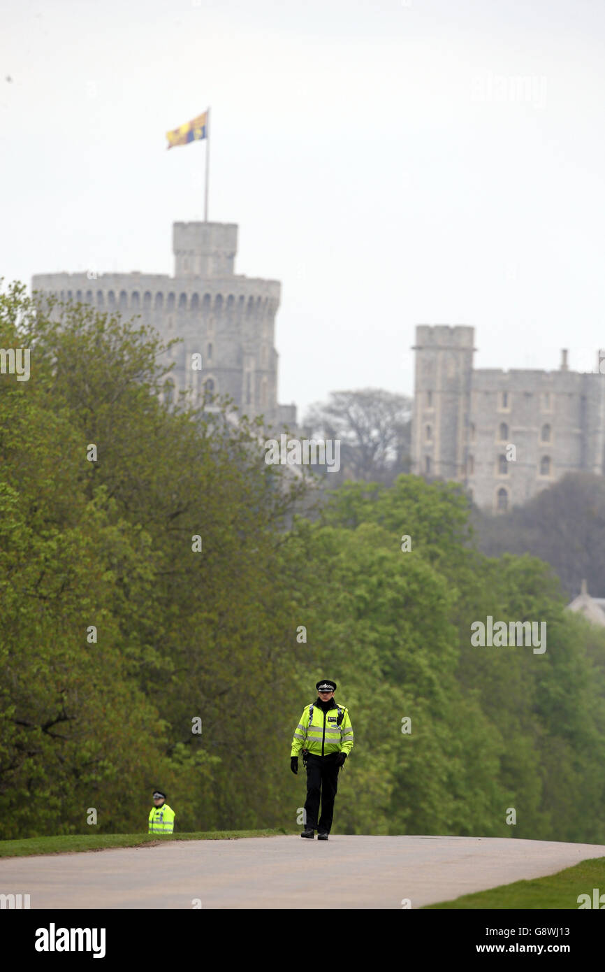 Police officers patrol the grounds of Windsor Castle as the President ...