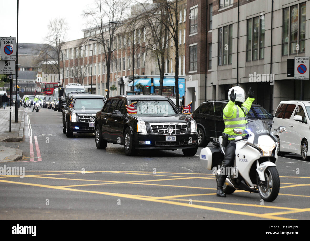 The motorcade carrying the President of the United States Barack Obama ...