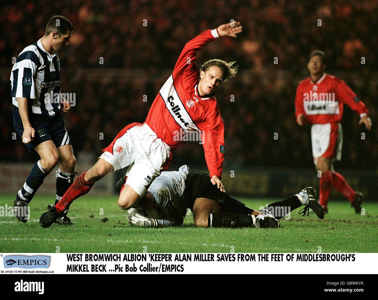 West Bromwich Albion goalkeeper Alan Miller (right) saves at the feet ...