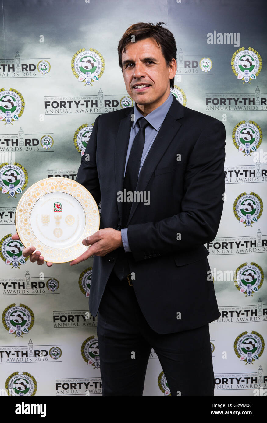 Wales manager Chris Coleman with a commemorative plate for qualifying ...