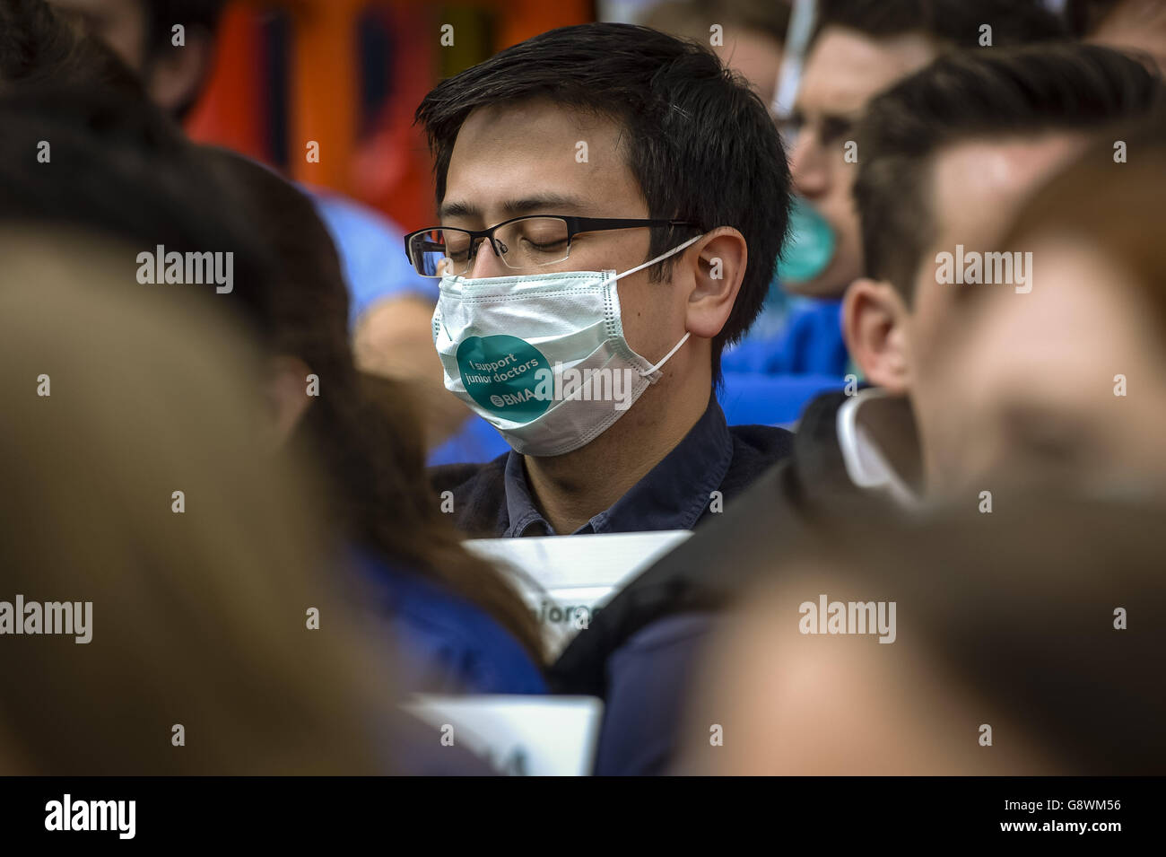 Junior doctors and supporters of the BMA strikes wear stickers over ...