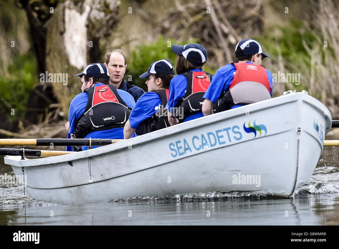 The Earl of Wessex takes the coxswain position aboard a boat joining ...