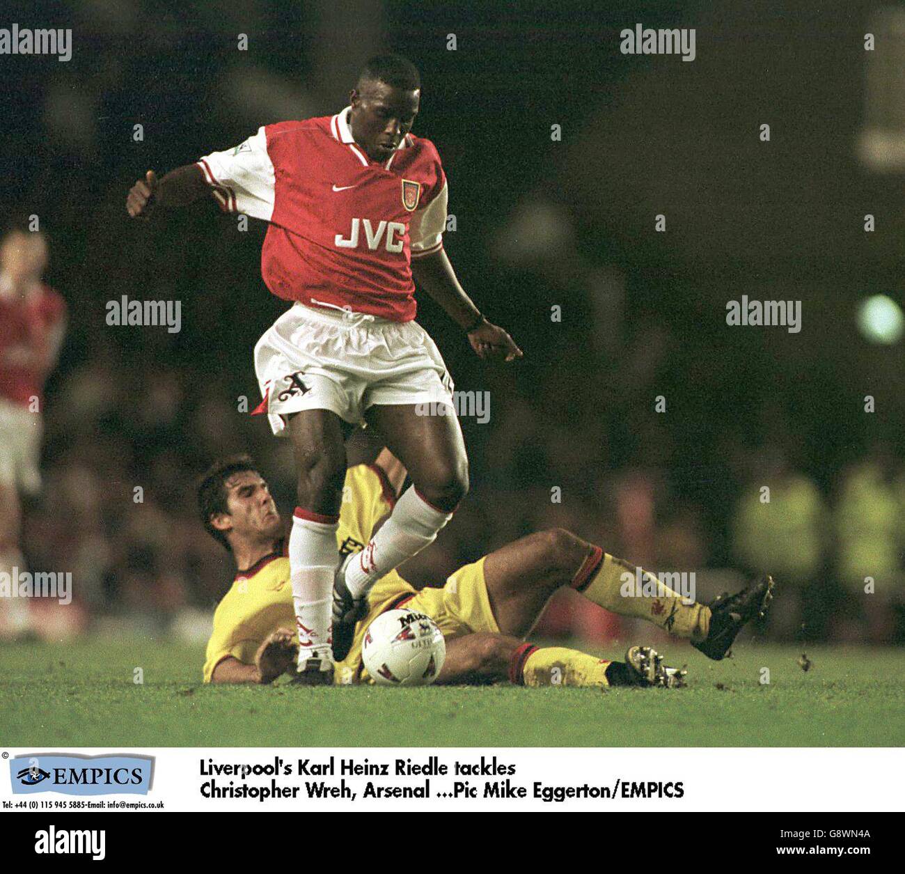 Two action full front view red yellow tackle npsel football hi-res ...