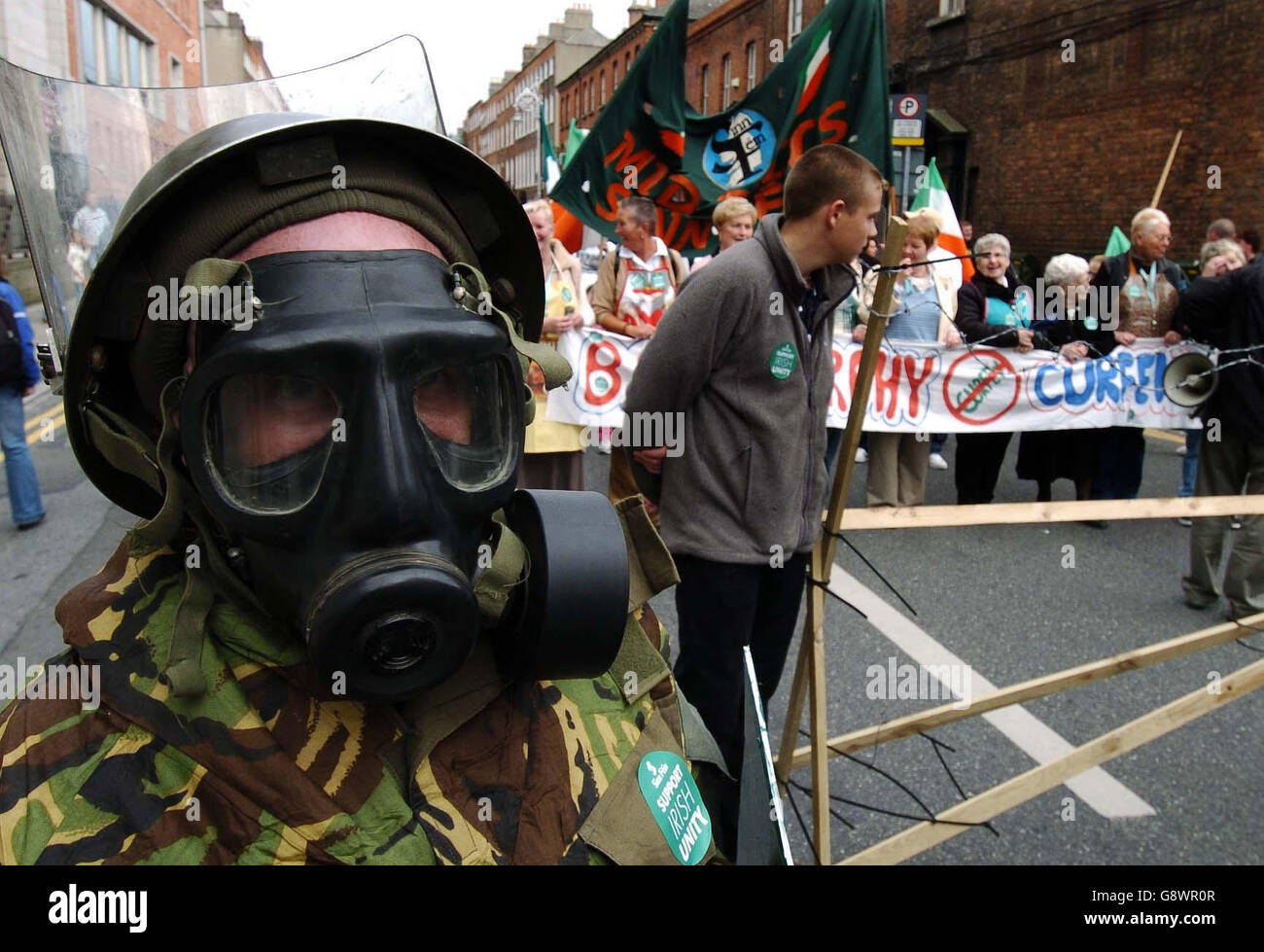 A Sinn Fein supporter dressed as a British soldier during a parade to ...