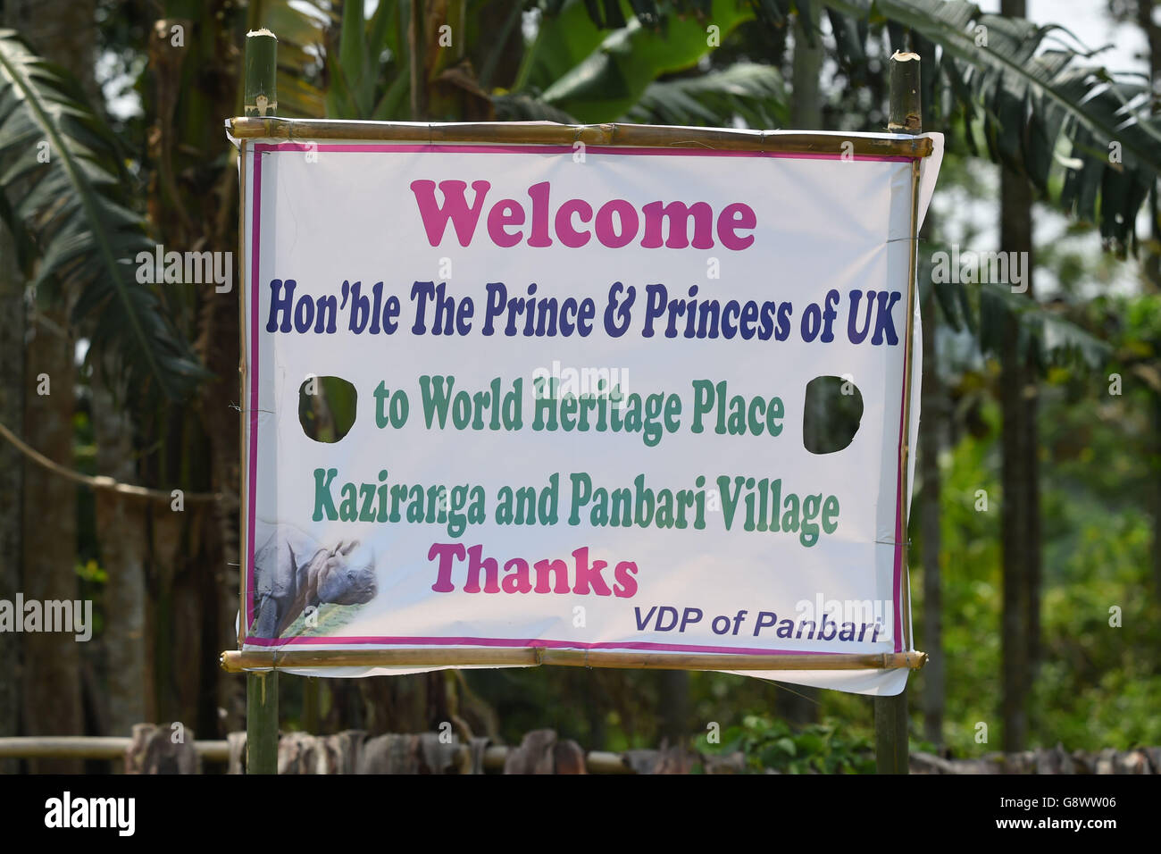 A sign welcoming the Duke and Duchess of Cambridge to Pan Bari Village ...