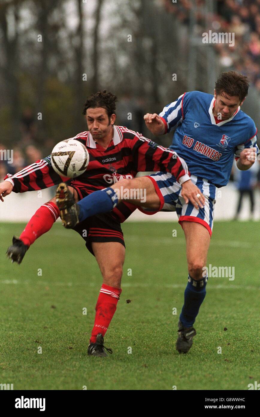 Two full action front view blue stripes tackle football hi-res stock ...