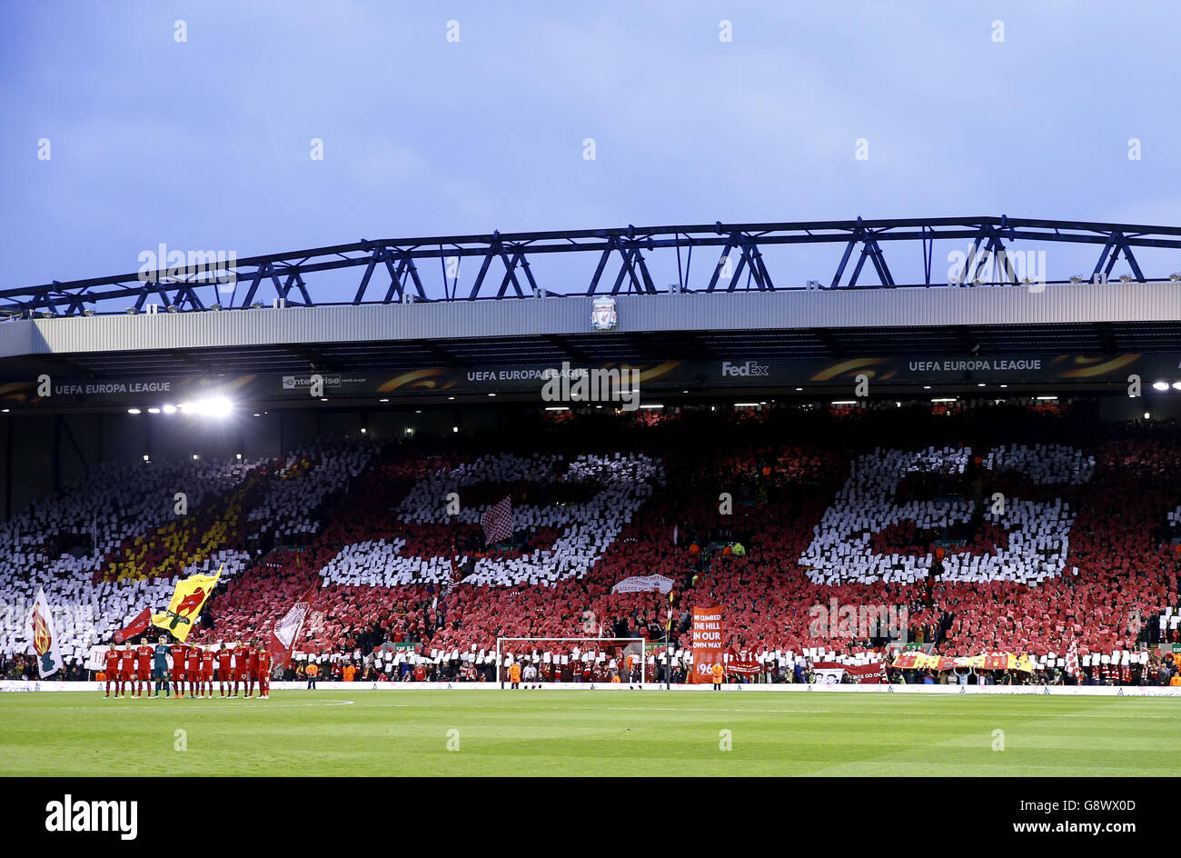 Liverpool players and the fans observe a minutes silence for the ...