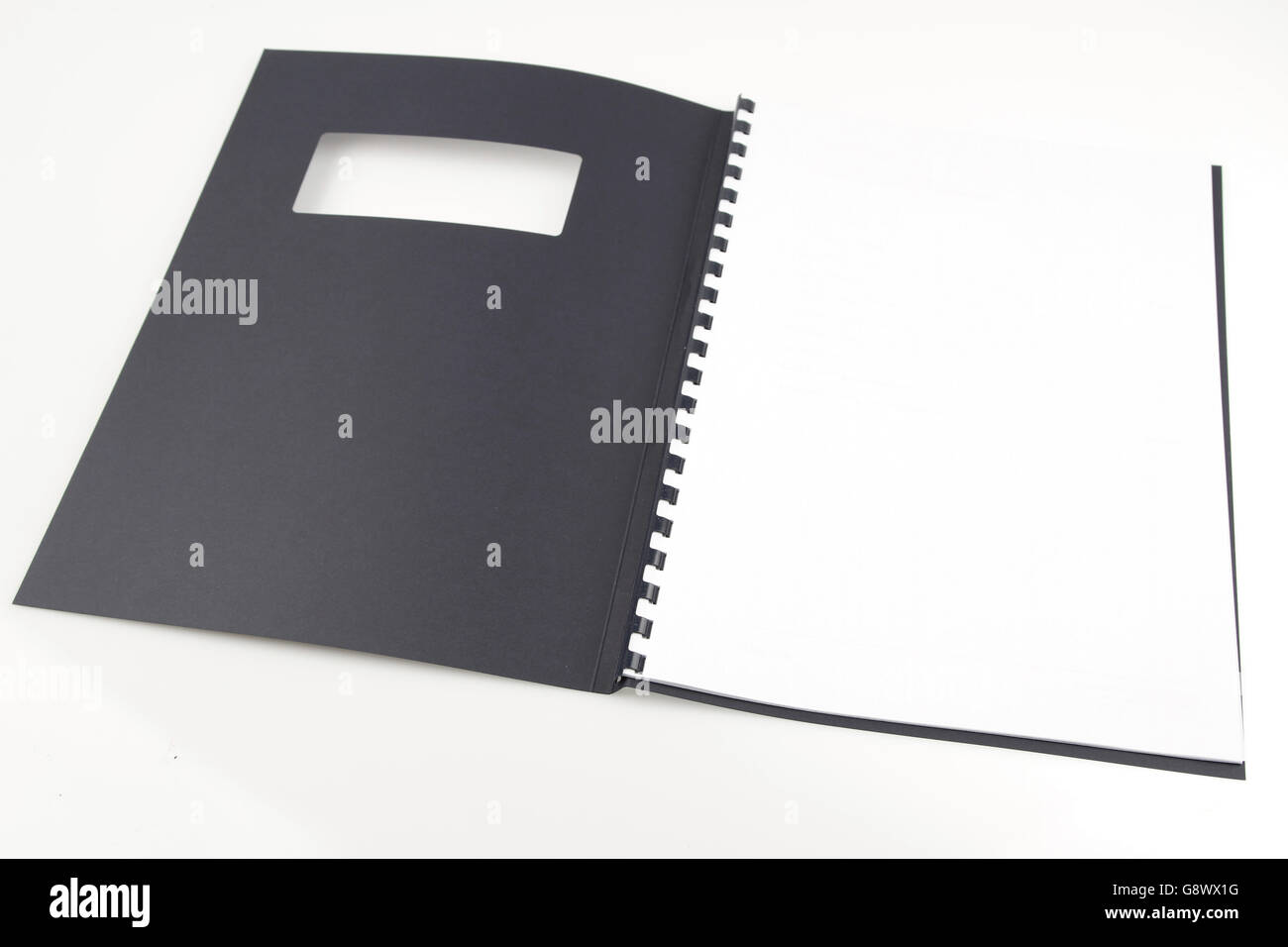 Open folder on plain background Stock Photo - Alamy