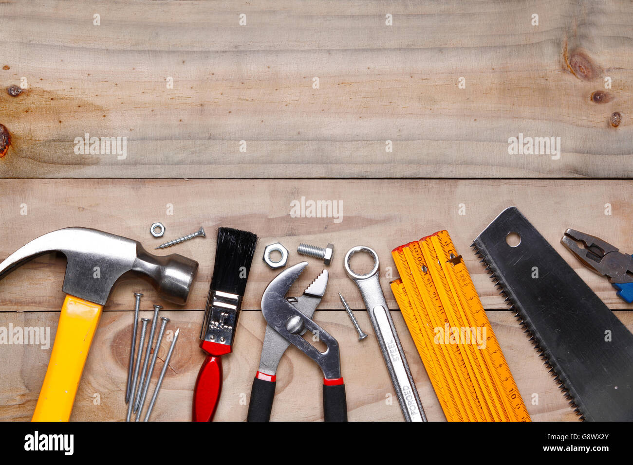 Assorted work tools on wood Stock Photo - Alamy