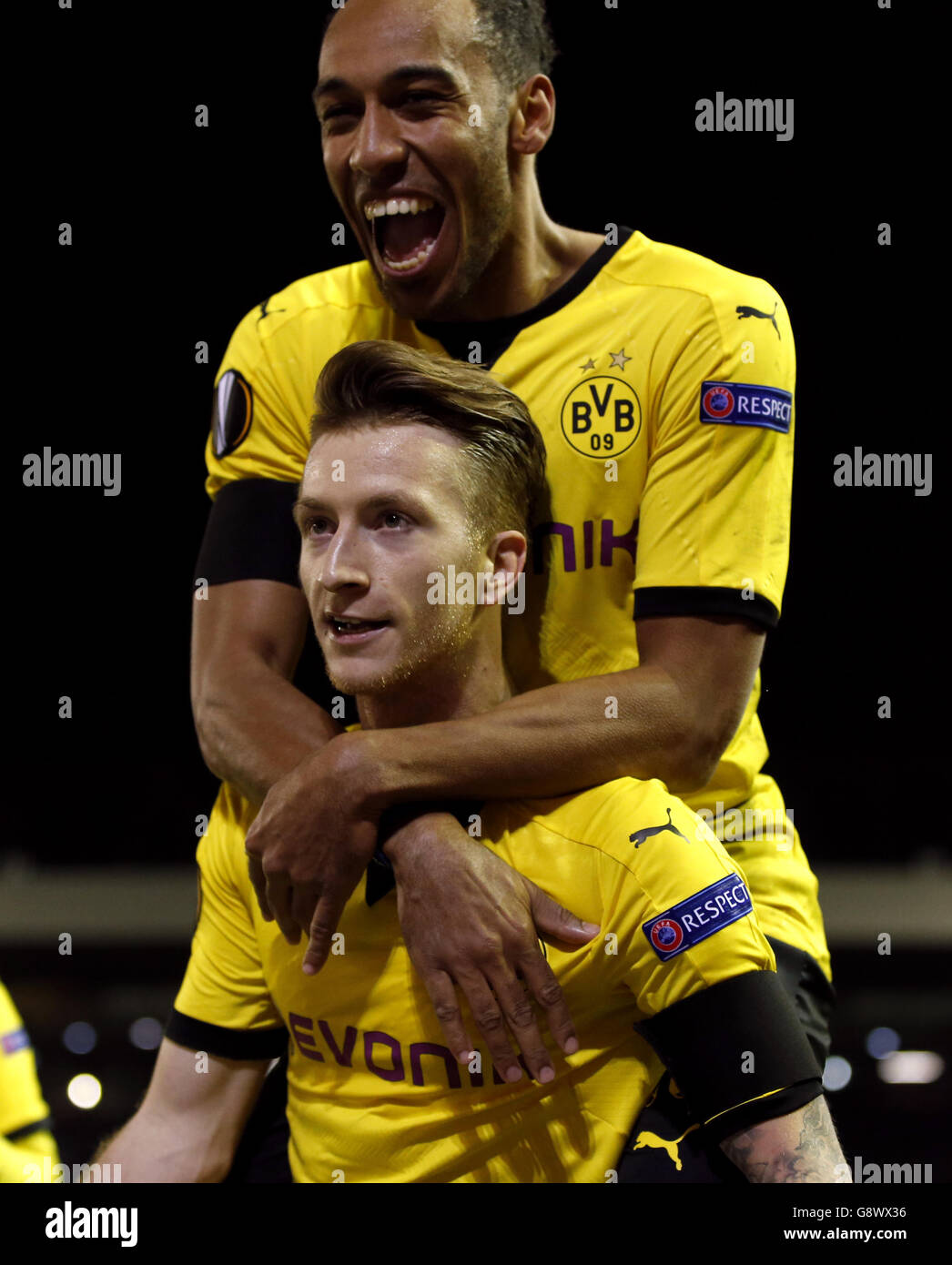 Borussia Dortmund's Marco Reus celebrates scoring his side's third goal ...