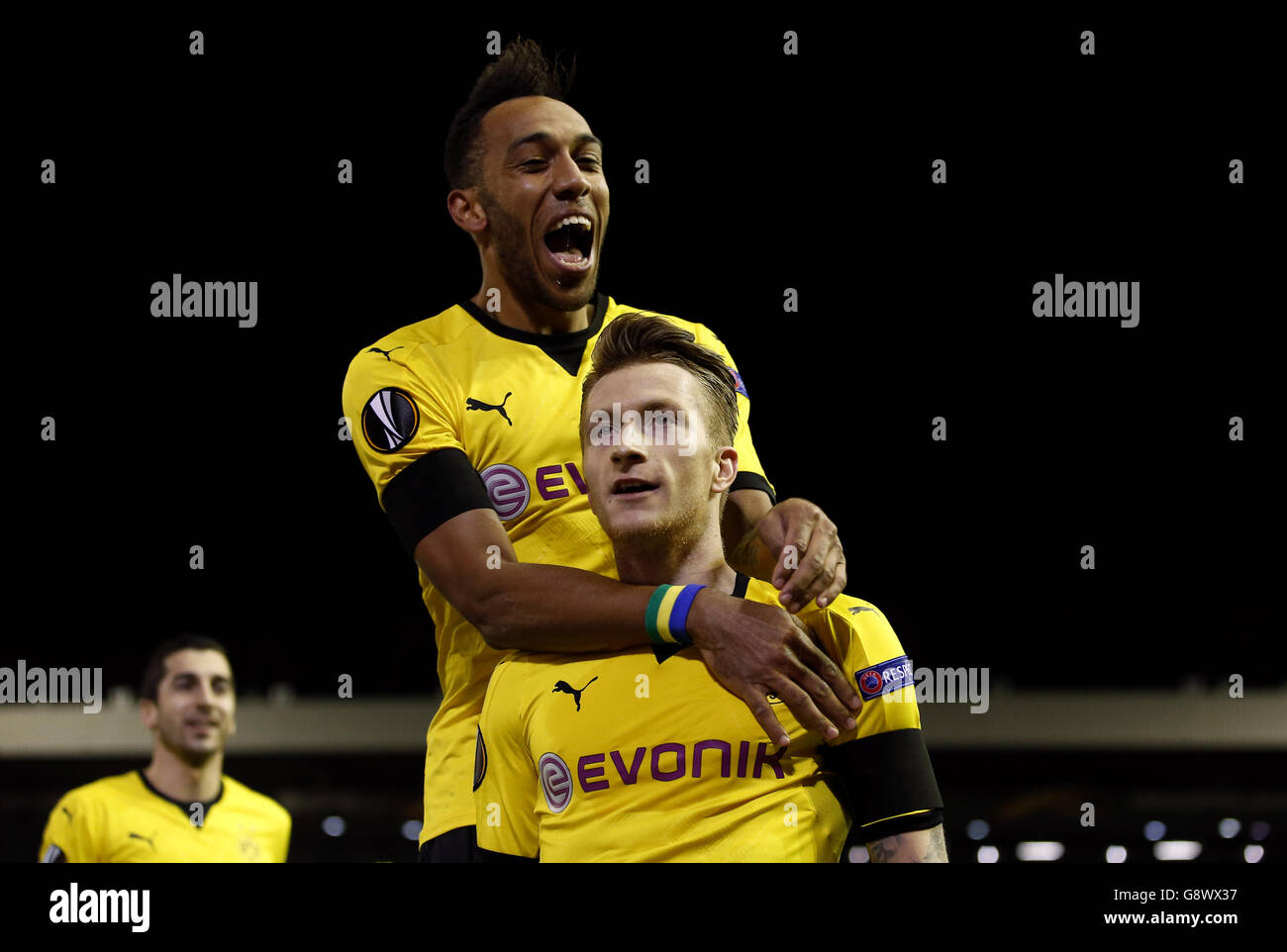 Borussia Dortmund's Marco Reus celebrates scoring his side's third goal ...
