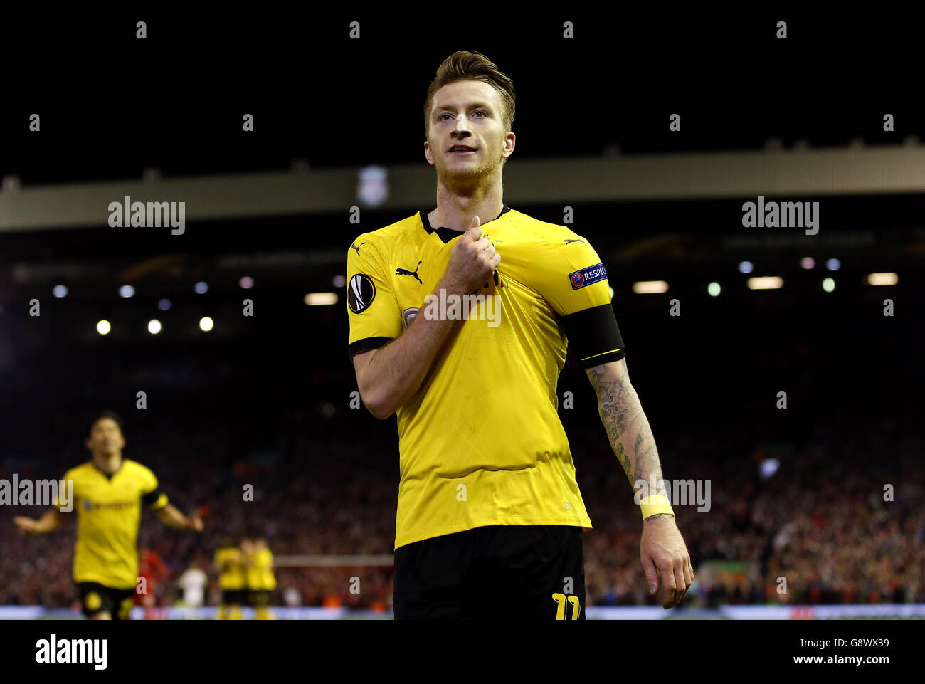 Borussia Dortmund's Marco Reus celebrates scoring his side's third goal ...