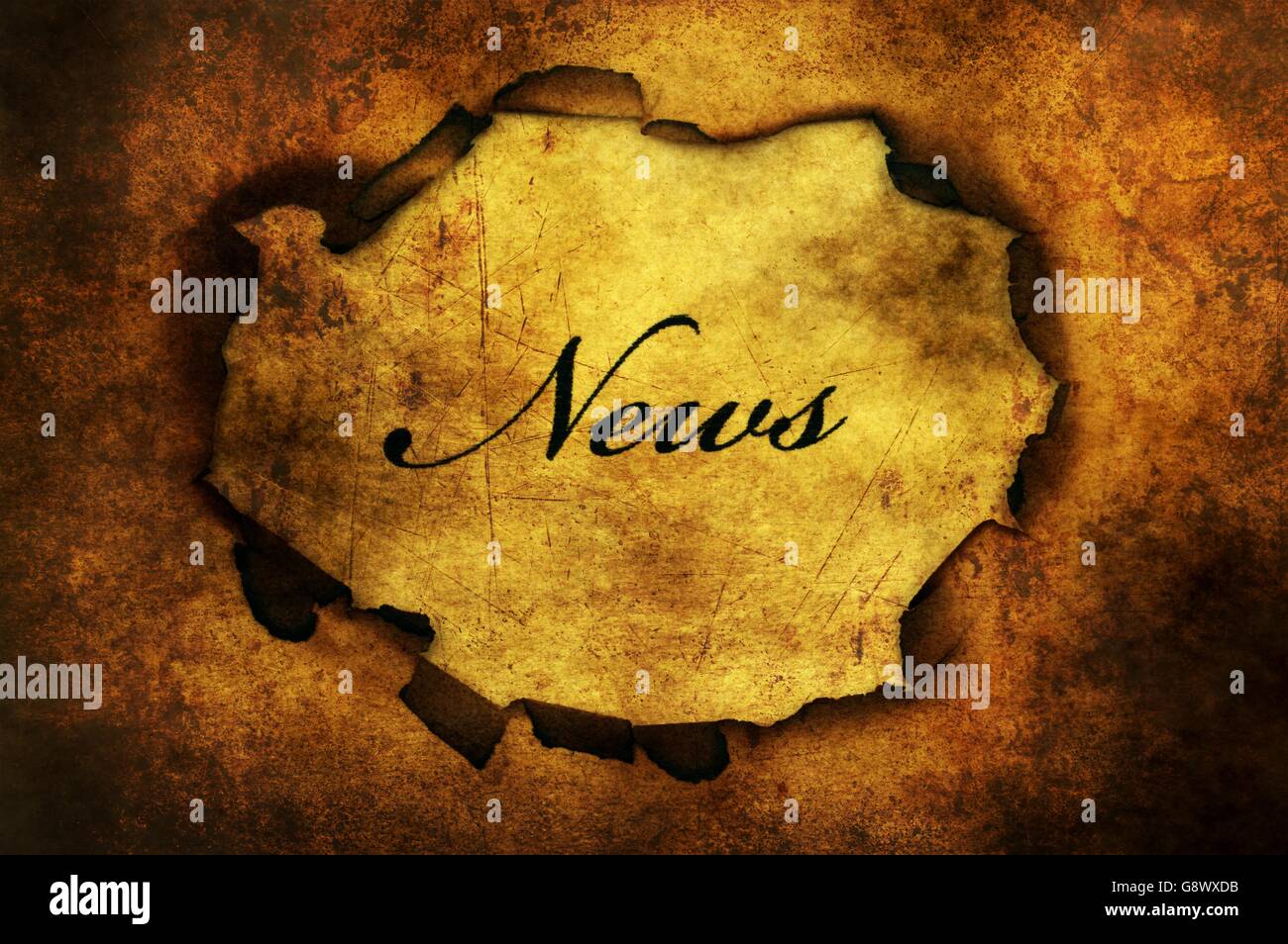 News paper hole grunge concept Stock Photo - Alamy
