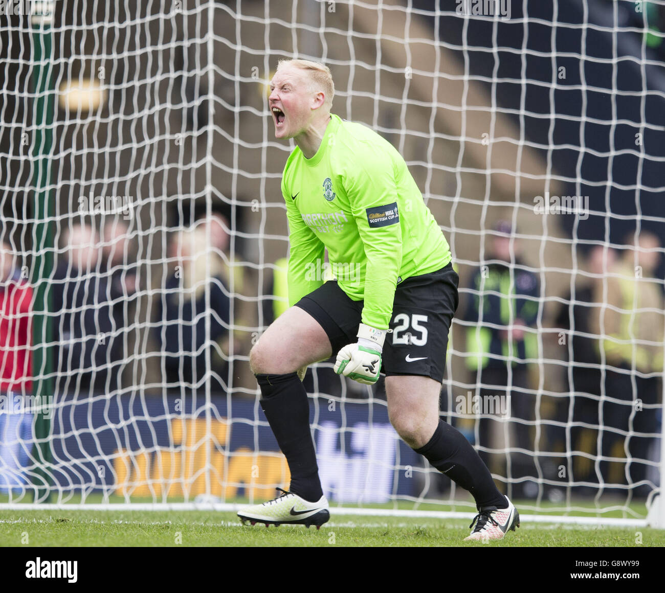 Hibernian goalkeeper Conrad Logan celebrates during the penalty shoot ...