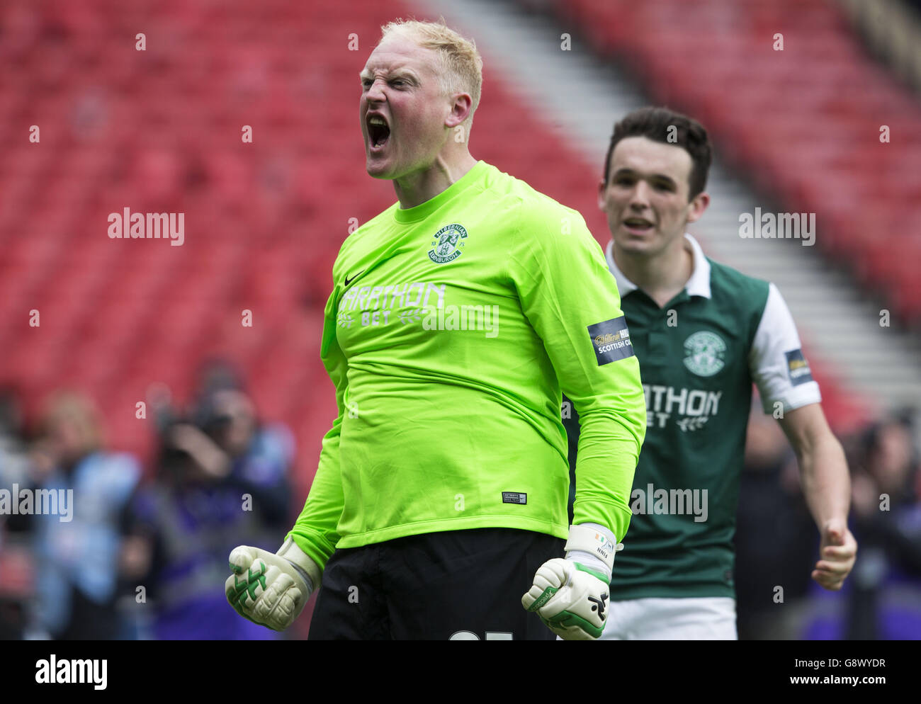 Hibernian goalkeeper Conrad Logan celebrates with team mates at the ...