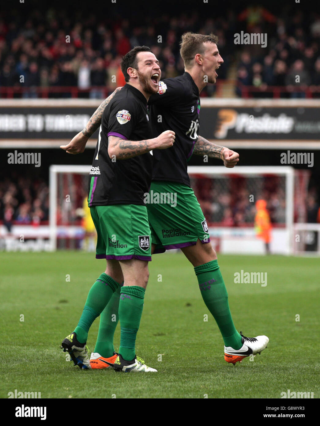 Bristol City's Lee Tomlin (2nd right) celebrates scoring against ...