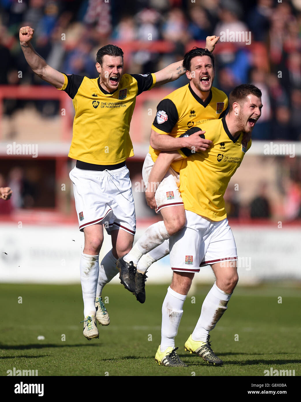 Northampton Town's Zander Diamond (left), David Buchanan (centre) and ...