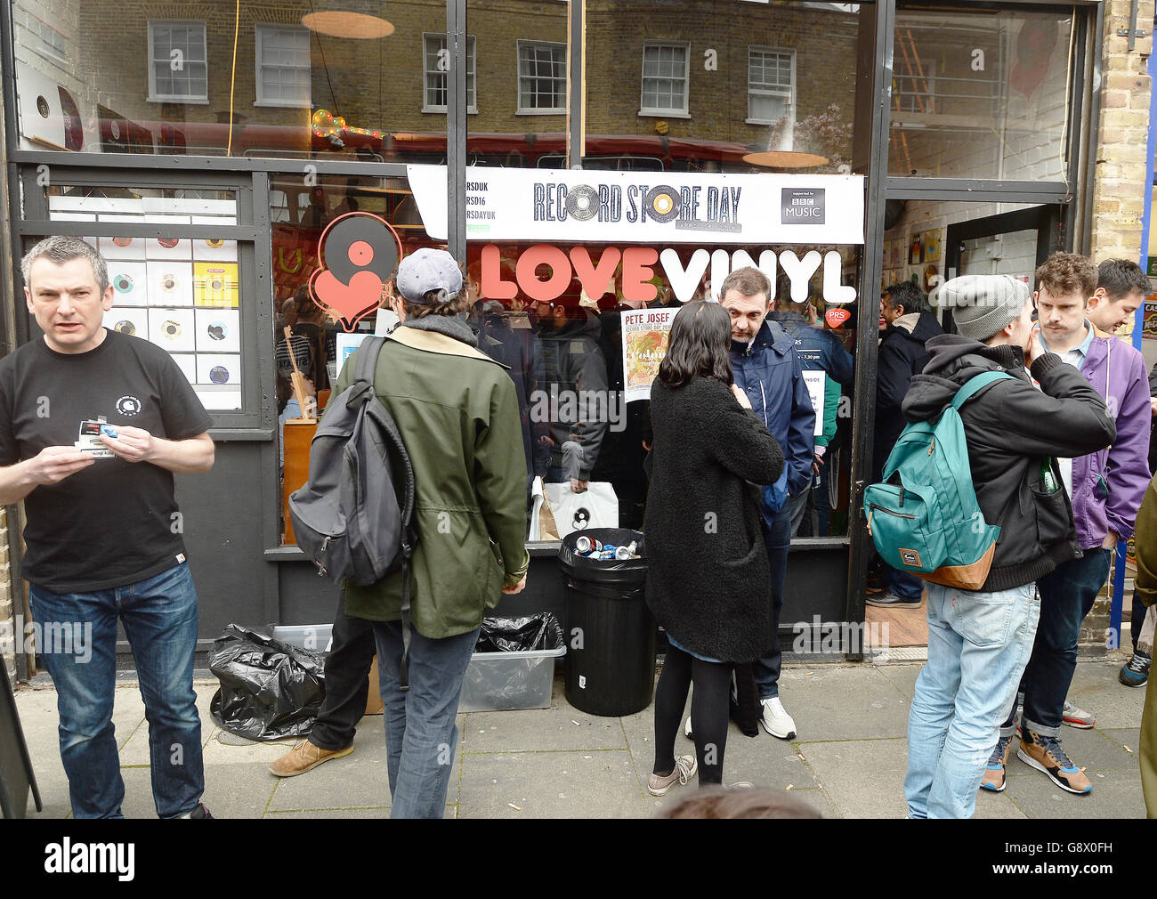Shoppers pack the Love Vinyl record shop in Hoxton, east London, one of ...