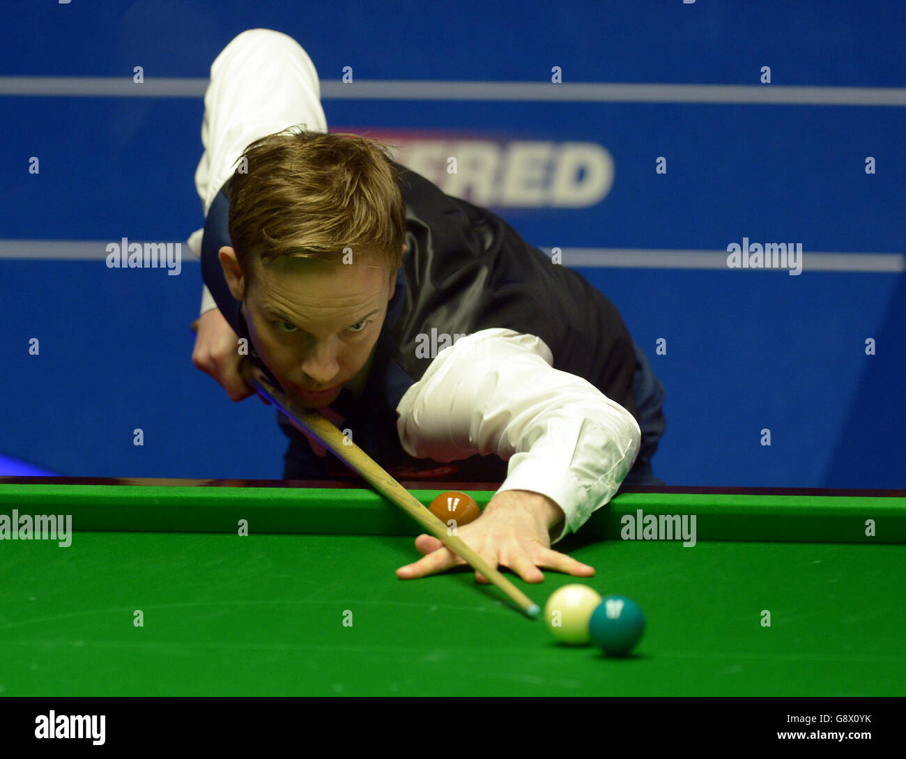 Ali Carter at the table in his match against Stuart Bingham during day ...