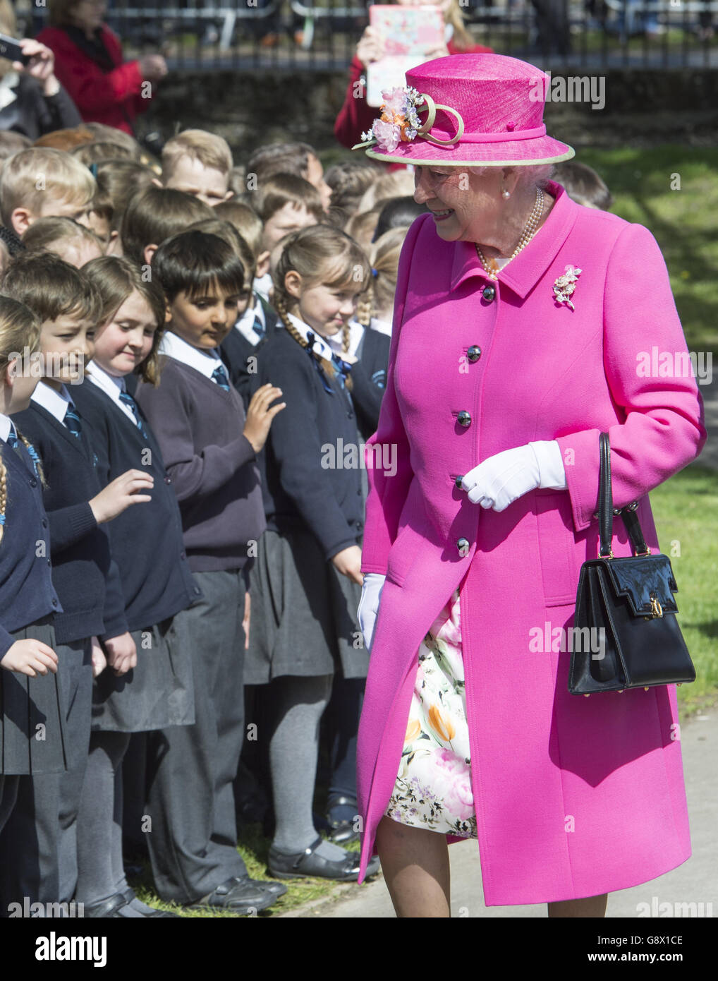 Queen Elizabeth II arrives to officially open the new bandstand at ...